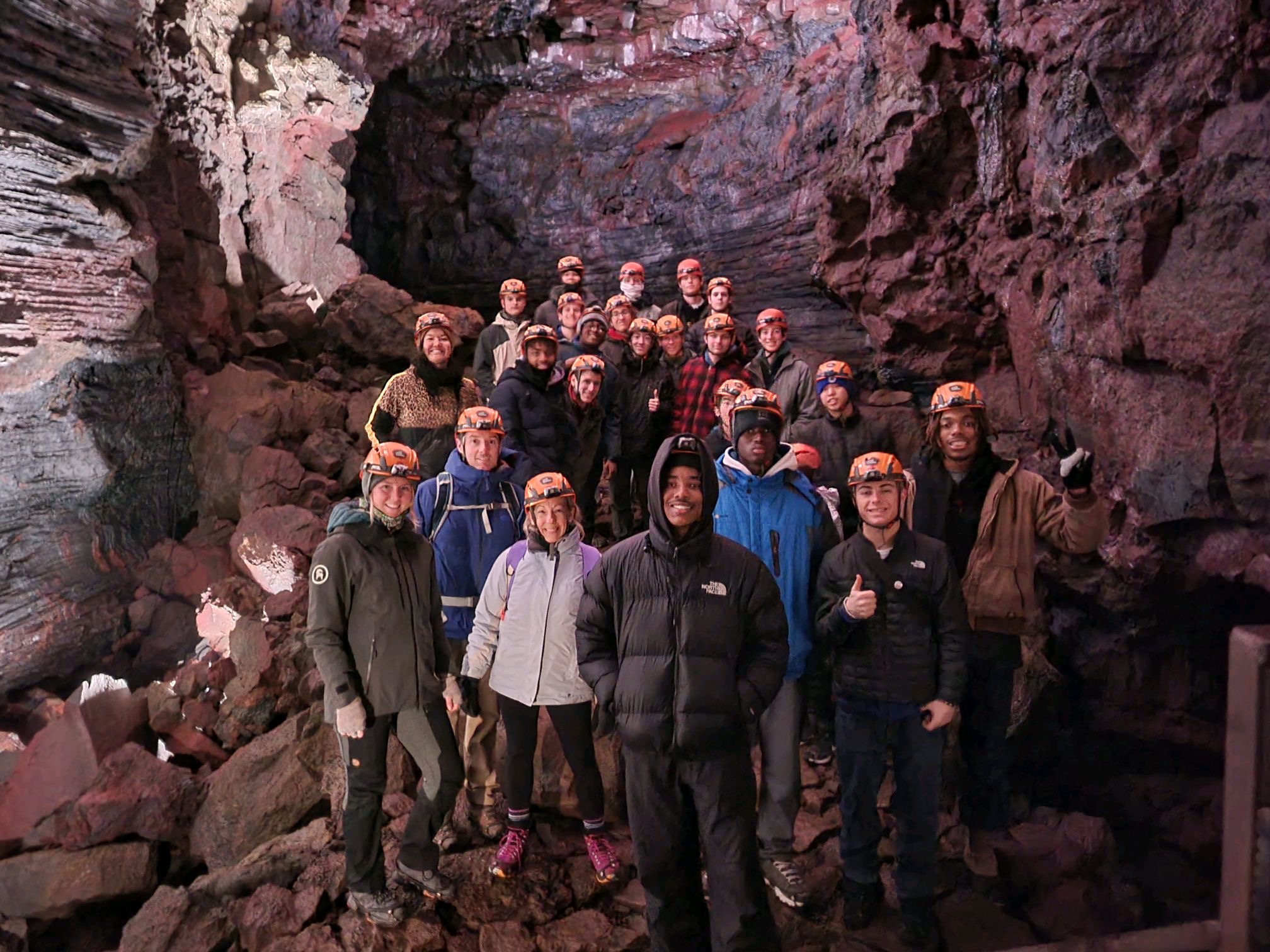 Global studies – Students and chaperones explore an Icelandic rock ...