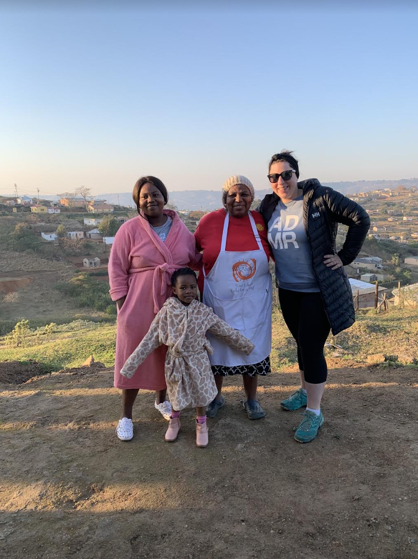 Ms. LaPenta 2- Ms. LaPenta with host family in South Africa – courtesy ...
